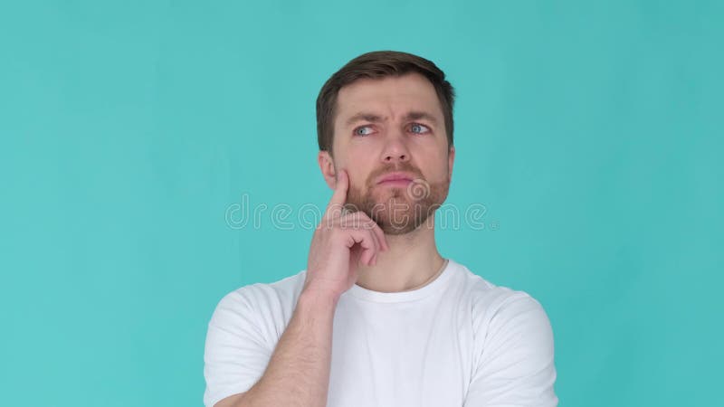 Confused Young Guy in White T-shirt Scratching His Head Thinking How To ...