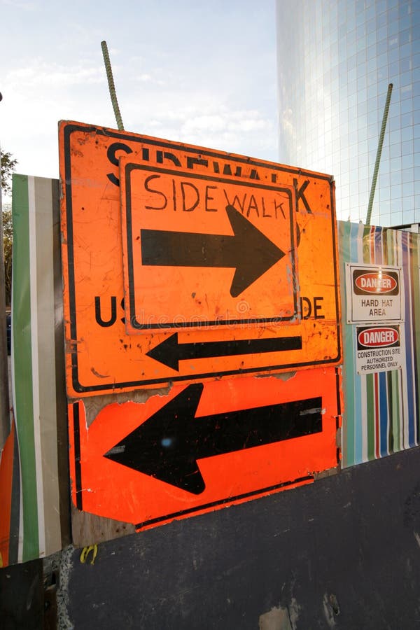 Confusing sidewalk sign stock photo. Image of color, uncertainty - 1399984