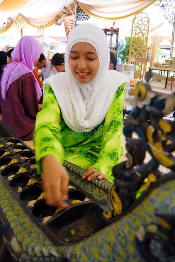 Congkak or Congklak editorial image. Image of malaysia - 27902775