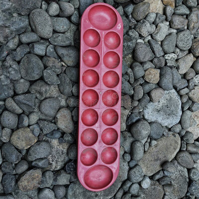 Congklak or dakon. stock photo. Image of dakon, toys - 338920498