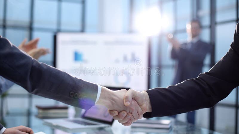 Congratulations on a Successful Deal with a Handshake Stock Photo ...