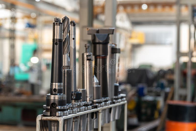 Conical and Collet Mandrels with Cutters and Drills on the Rack ...