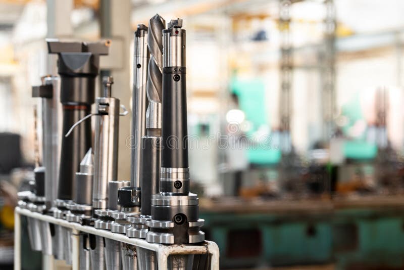 Conical and Collet Mandrels with Cutters and Drills on the Rack ...
