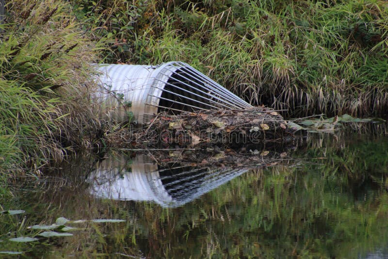 A Conical Frame Added To the End of Culvert Stock Photo - Image of ...