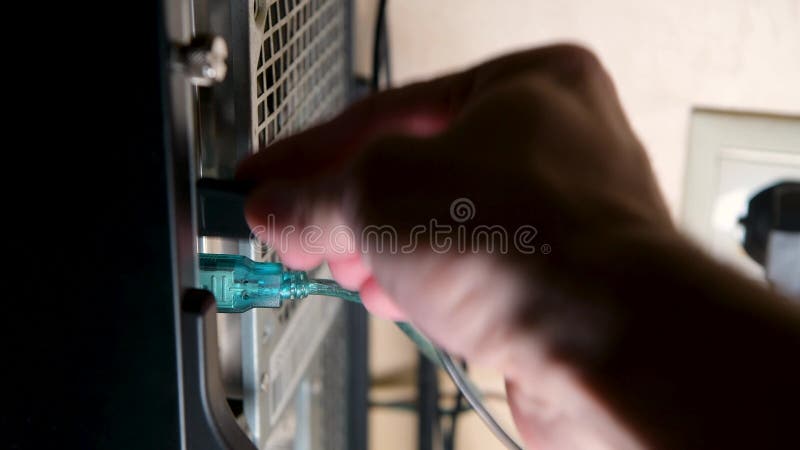 Connect Devices To the Desktop System Unit. Hand Inserts Device Plugs ...