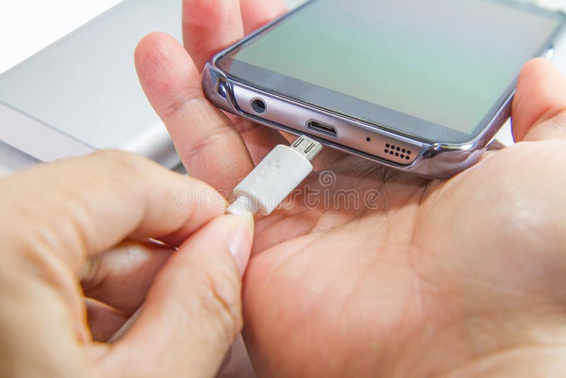 Connect the Power Bank To Mobile Phone Stock Photo - Image of battery ...