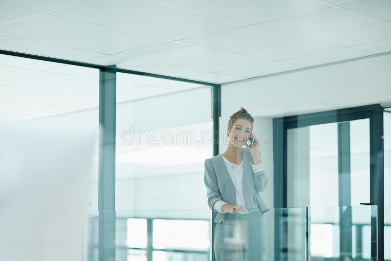 Always Connected, always Available. a Young Businesswoman Talking on a ...