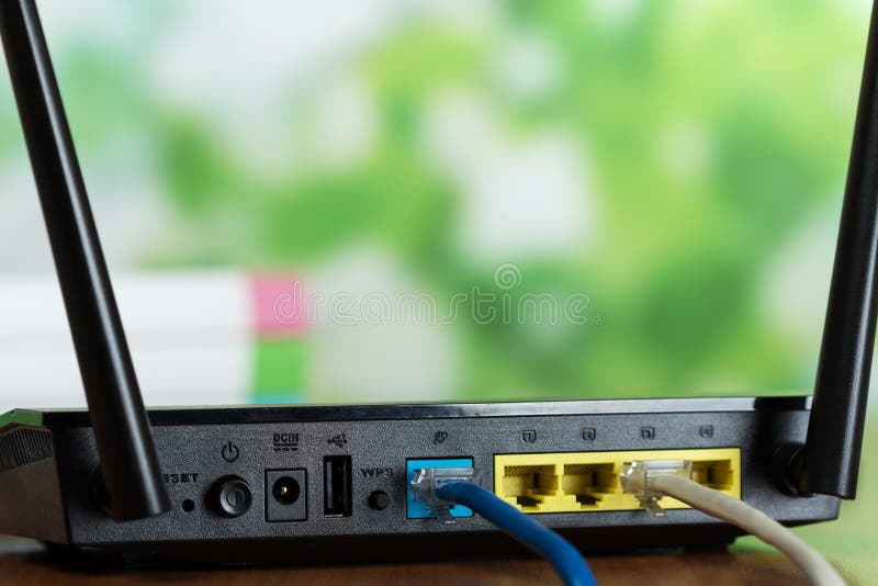 Connected Connectors of a Black Router in a Bright Office Stock Image ...
