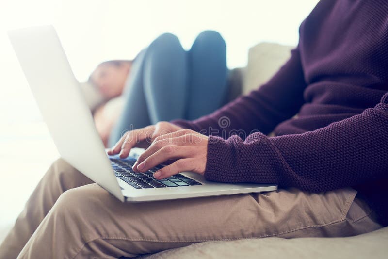 Connected Living is Comfortable Living. a Man Sitting on the Sofa Using ...