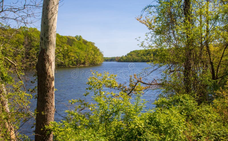 Connecticut River in Spring with a Distant Railroad Bridge Stock Image ...