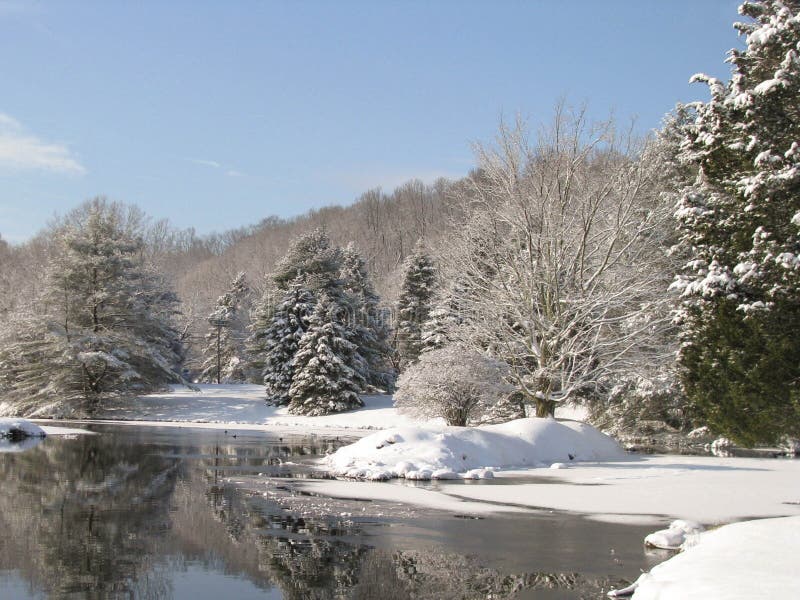 Connecticut Snow Around the Lake Stock Image - Image of snow, clouds ...