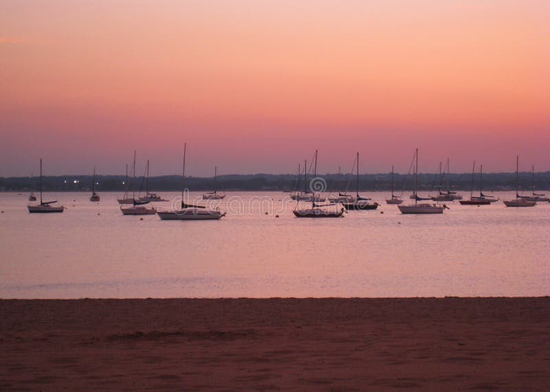 Connecticut sunset stock image. Image of beach, boat, sunset - 5880241