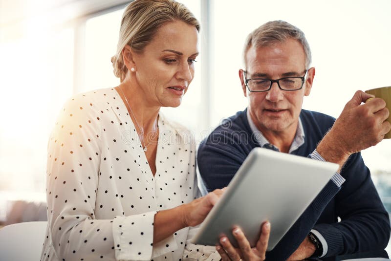 Connecting As a Couple with Modern Tech. a Mature Couple Using a ...