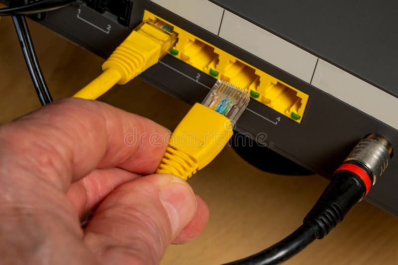 Connecting the Device To the Internet Using a Cable. Stock Photo ...