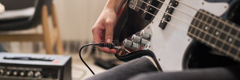 Connecting Electric Guitar for an Amplified Performance Stock Image ...