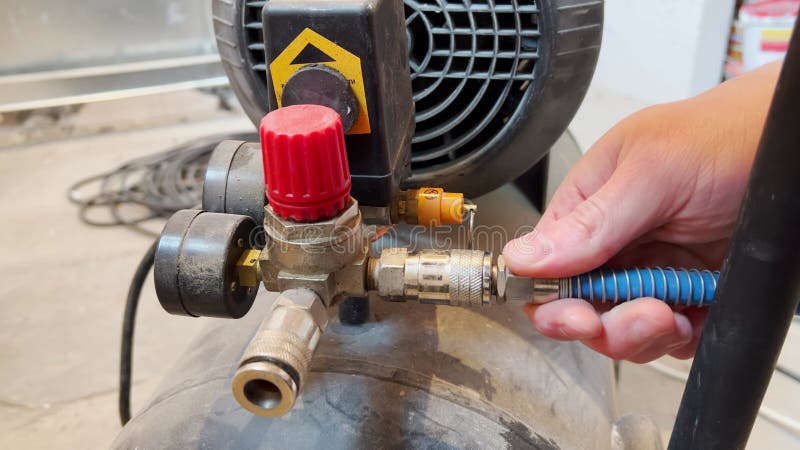 Connecting the High Pressure Hose To the Air Compressor. Stock Video ...