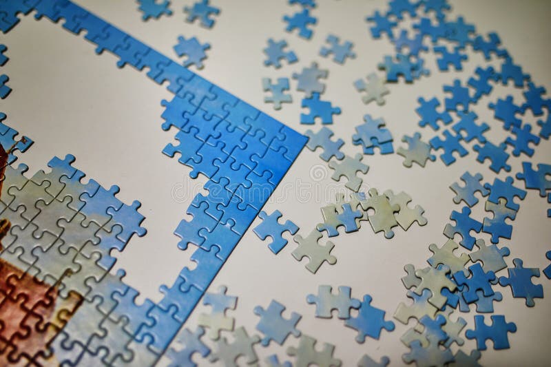 Connecting Jigsaw Puzzle Pieces, Fun Family Activity. Stock Image ...