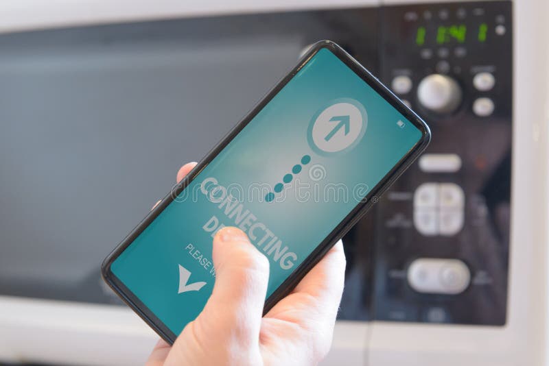 Connecting Microwave Oven with Smart Phone Stock Image - Image of home ...