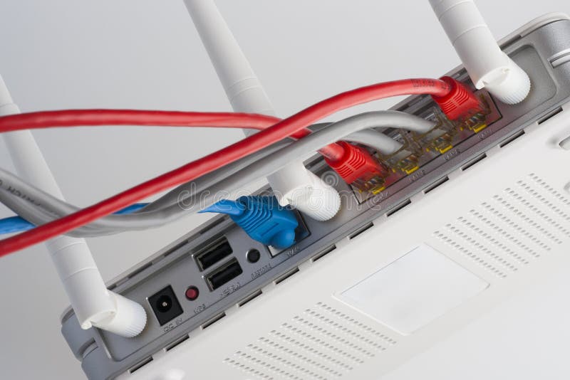Network Cables Connected To the Router. Network Communications Stock ...