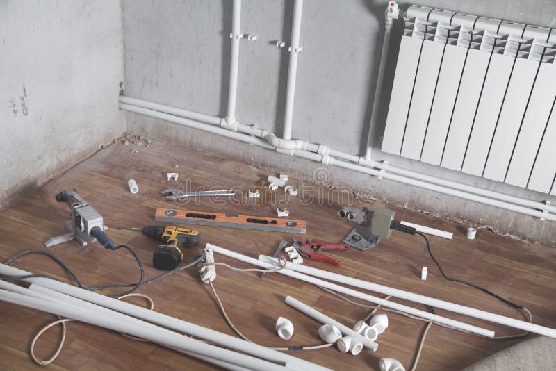 Connecting Plastic Pipe. Installing Water Heating Radiator Stock Photo ...