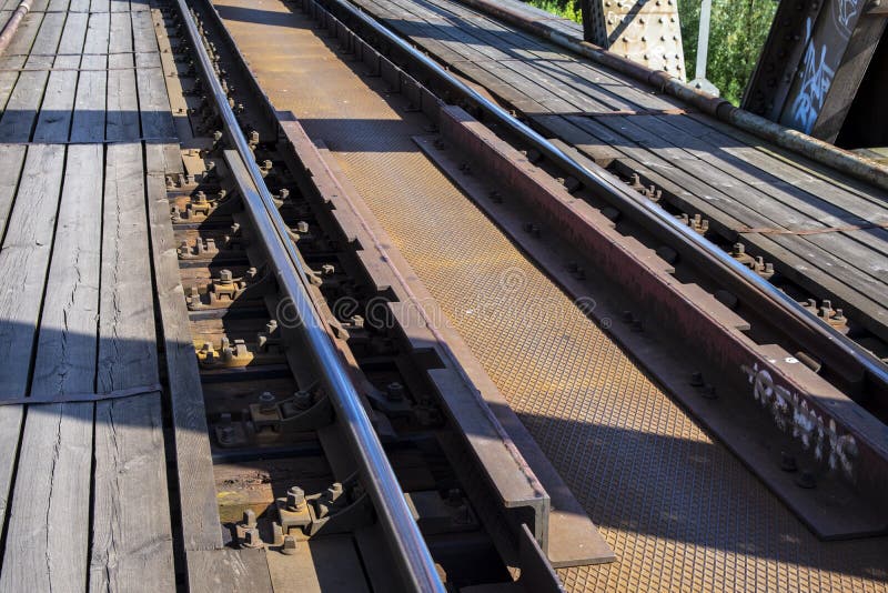 Connecting Rails on the Viaduct Along the Tracks. Day Stock Image ...