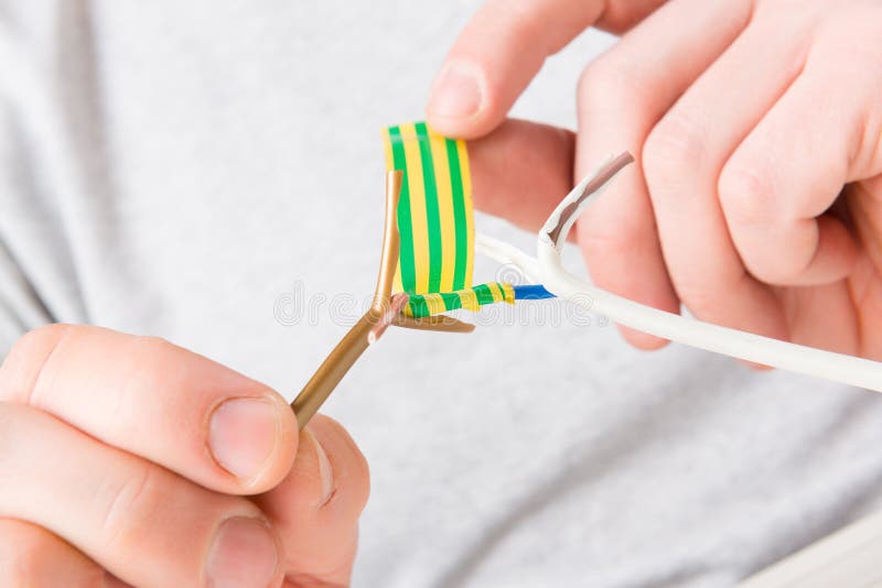 Connecting a wire stock image. Image of safety, copper - 51706615