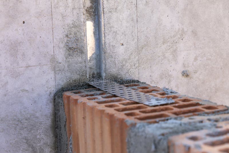 Connection of Building Blocks with Cellar Wall in Metal Stock Image ...