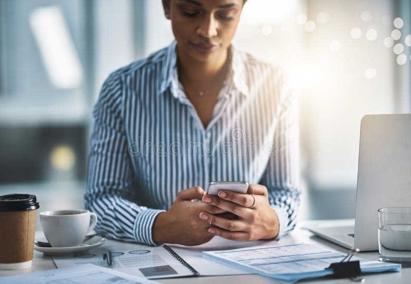 Connectivity Keeps Her on Top of Things. a Young Businesswoman Using a ...