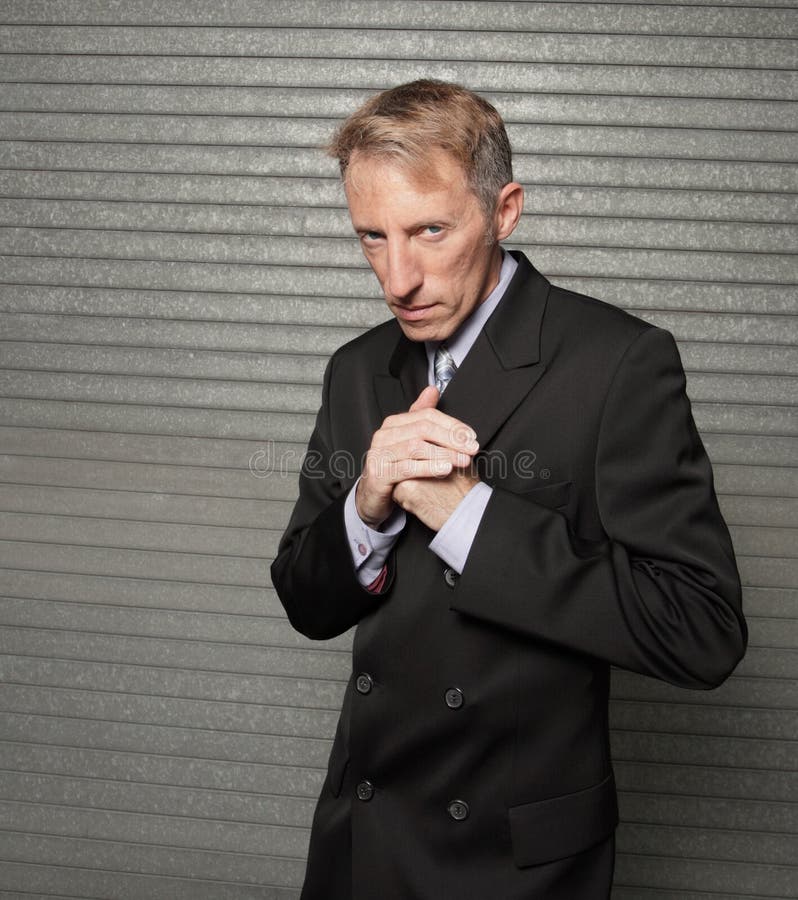 Conniving businessman stock photo. Image of body, mature - 9984304