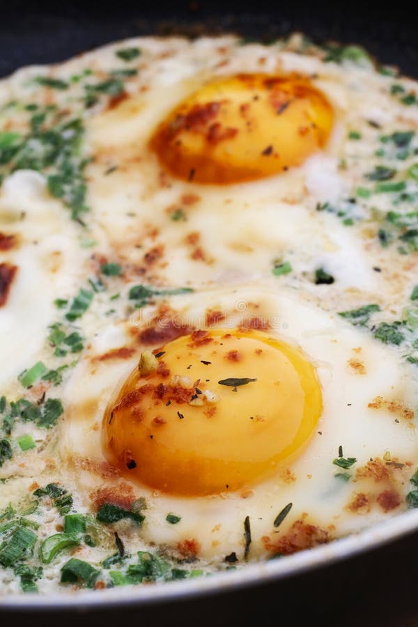 Consecutive Steps of Preparing Fried Eggs with Ham and Herbs Stock ...