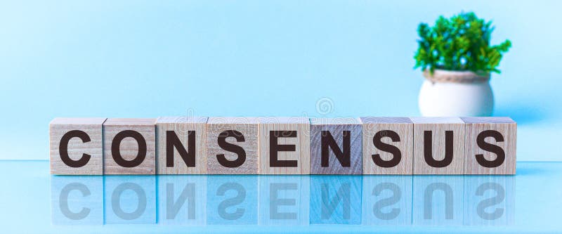 Consensus - Text on Wooden Cubes on a Blue Gradient Background Stock ...