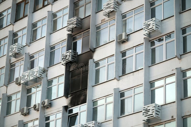Consequences of a Fire in a Multi-storey Building. Damaged Multi-storey ...