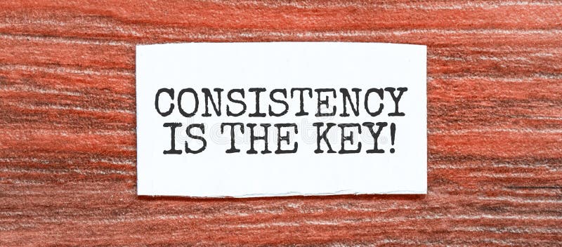 CONSISTENCY is the KEY, Text on White Paper on Gray Background Stock ...