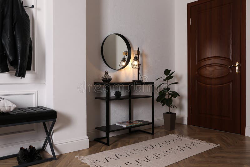 Console Table with Decor and Mirror on Wall in Hallway. Interior Design ...