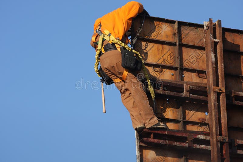 Worker with lifting ropes stock image. Image of fitting - 769897