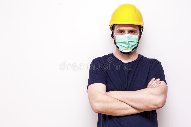 Constraction Worker Behind White Background. Wearing Green Mask and ...