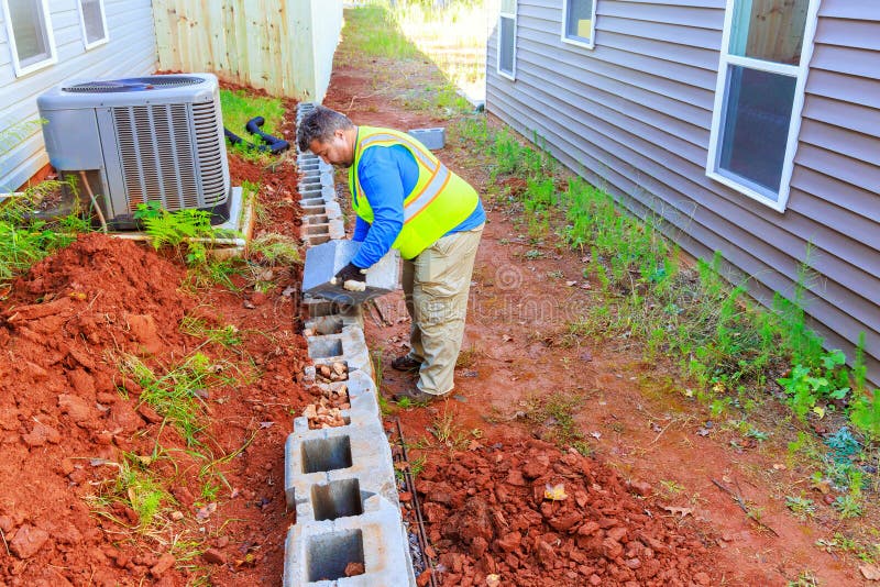Constructing Retaining Walls that are Being Installed by a Contractor ...