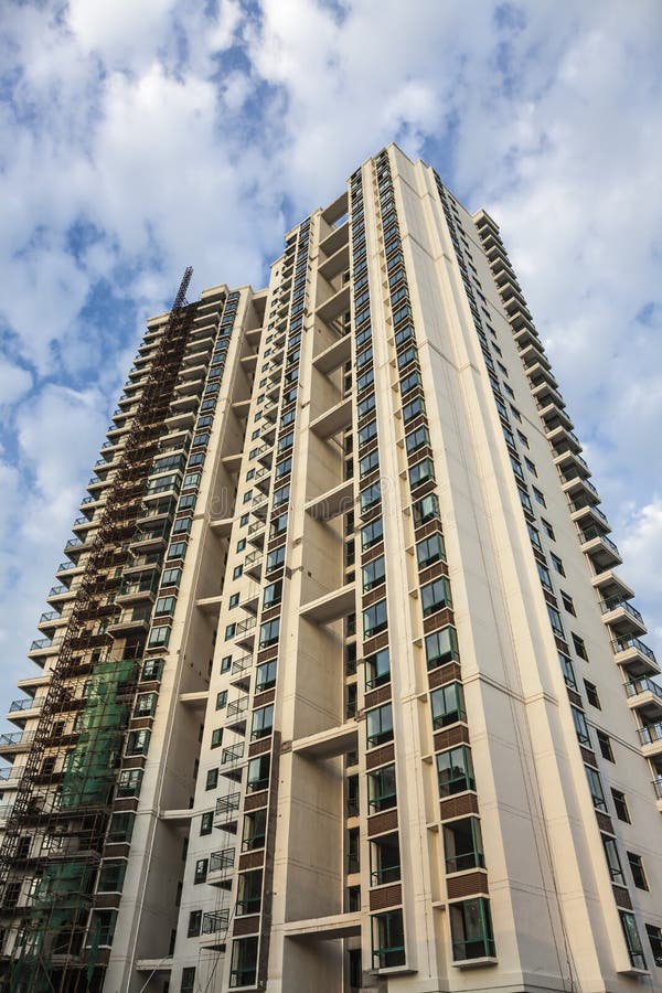 Constructing Tall Apartment Building Stock Photo - Image of ...