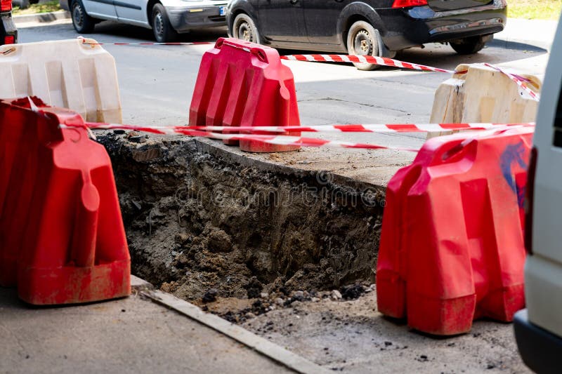 Construction Activity Causes Roadway Hazard with Deep Excavation Site ...
