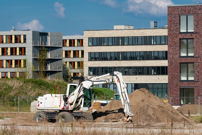 Construction Activity Features Excavator Working on a Building Site ...