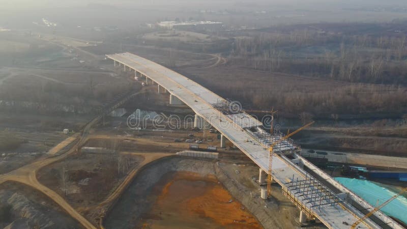 Highway Overpass Construction Progressing Over River Stock Footage ...
