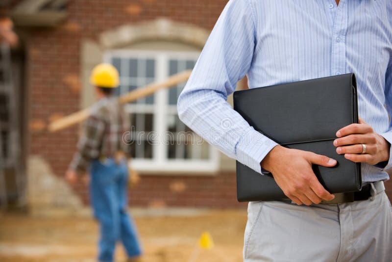 Construction: Agent Holding Portfolio with Worker in Background Stock ...