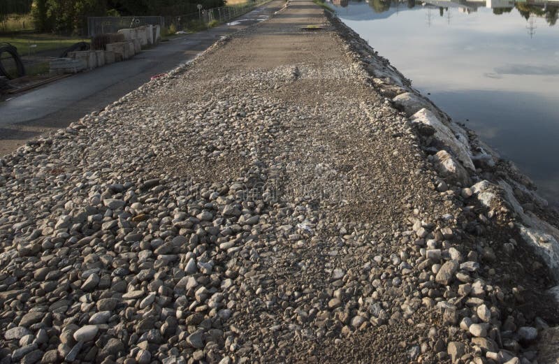 Construction Aggregate in River Regulation Stock Photo - Image of ...