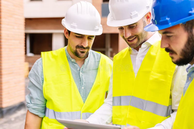 Construction Architect Engineers Working on Building Site Stock Image ...