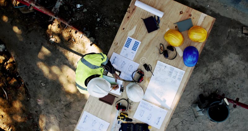 Construction, Architect and Person Writing Checklist with Blueprint for ...