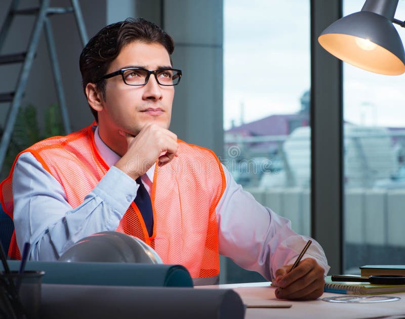 Construction Architect Working on Drawings Late at Night Stock Image ...