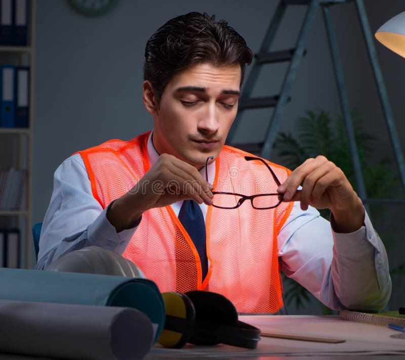 Construction Architect Working on Drawings Late at Night Stock Image ...