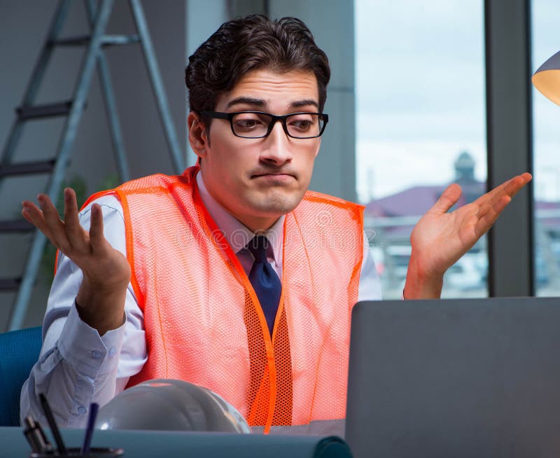 Construction Architect Working on Drawings Late at Night Stock Photo ...