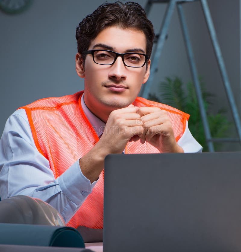 Construction Architect Working on Drawings Late at Night Stock Photo ...