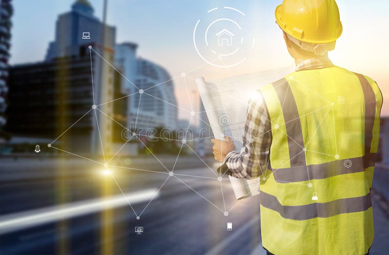 Construction Architects Review Plans at a Construction Stock Image ...